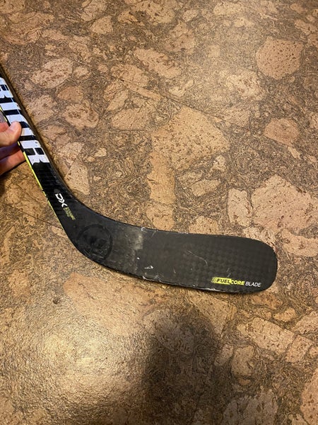 Warrior Alpha DX Pro Stick | SidelineSwap | Buy and Sell on SidelineSwap