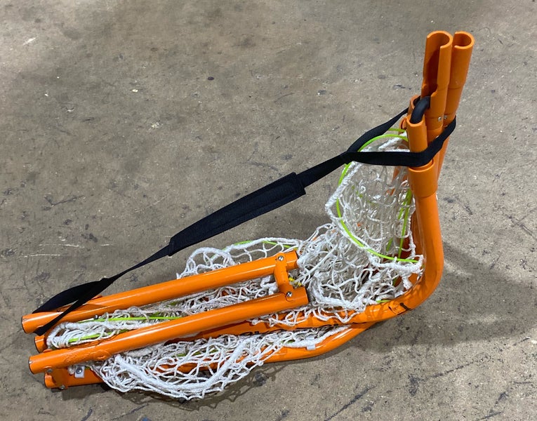 A pre-owned Rage Cage Mini Lacrosse Goal that's foldable, fully ...