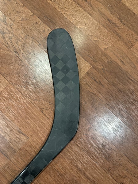 All black pro stock hockey stick | SidelineSwap | Buy and Sell on ...