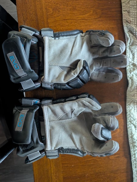 Warrior Evo Lacrosse Gloves (Used) | SidelineSwap | Buy and Sell on ...